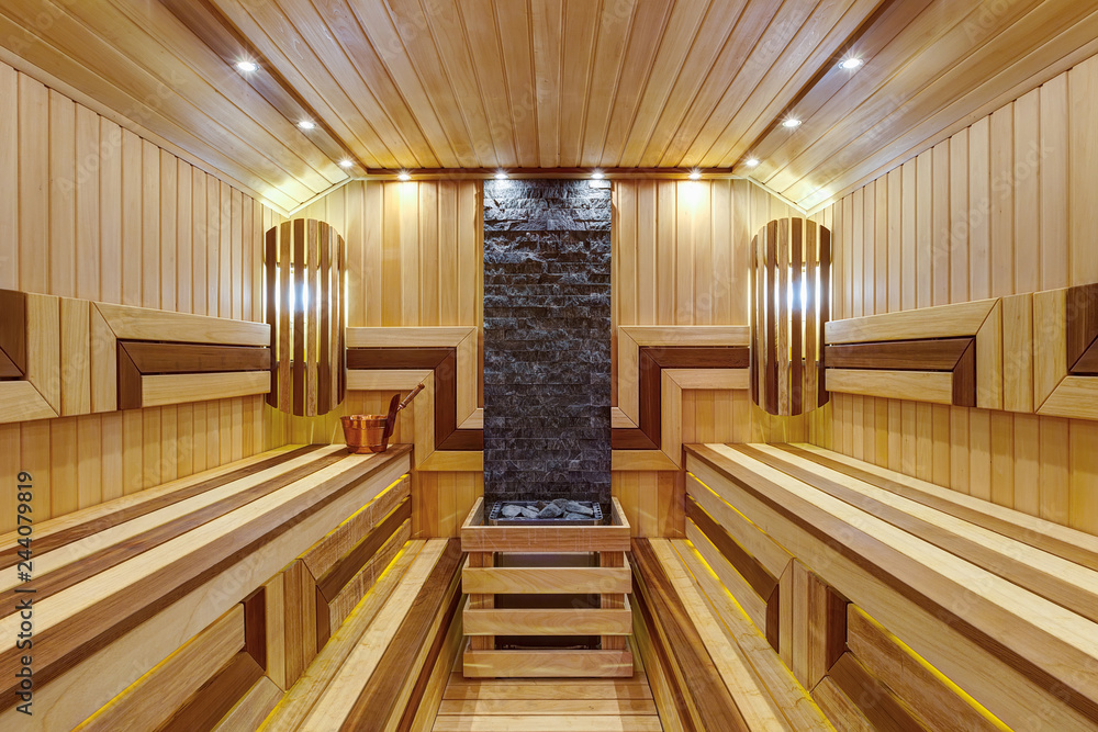 Inside in big Russian bath. Interior of wooden sauna in light and dark ...