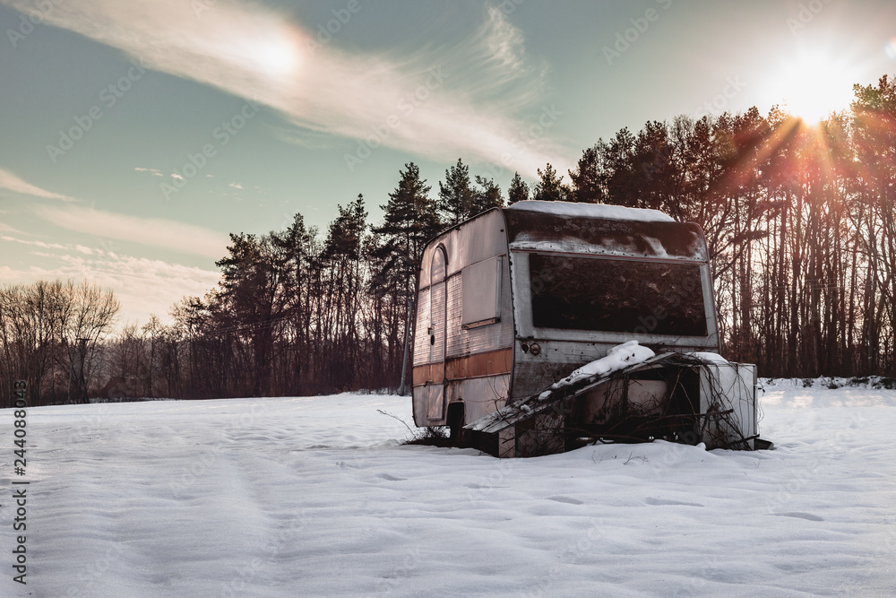 Beautiful photo of old and abandoned caravan in the middle of snow ...