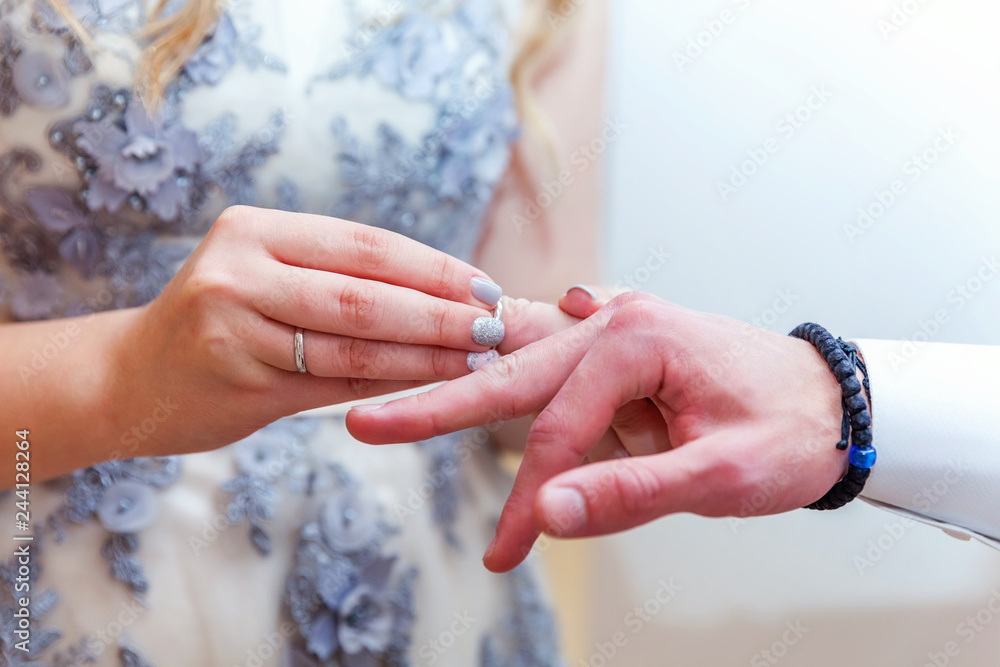Putting Wedding Ring On Hand