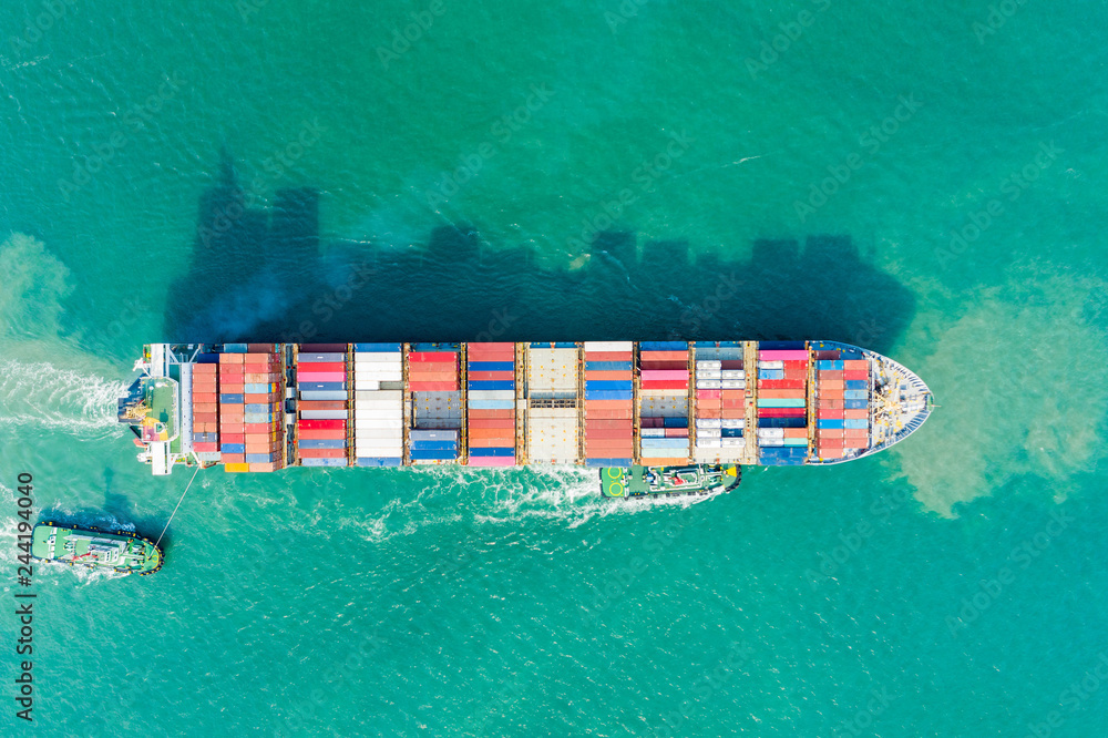 Aerial view and top view. Container ship in pier with crane bridge ...