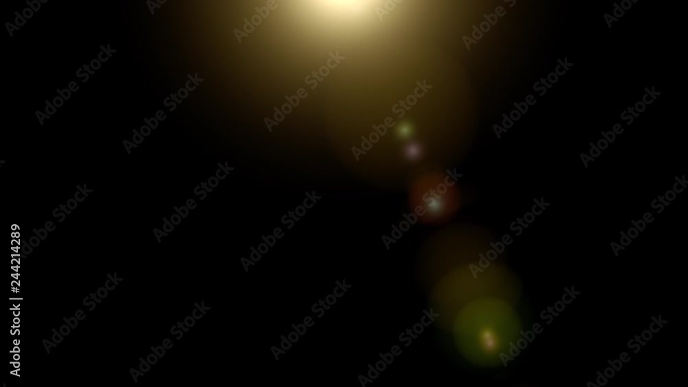 A lens flare made by the sun, moving along a horizontal axis. Digital ...
