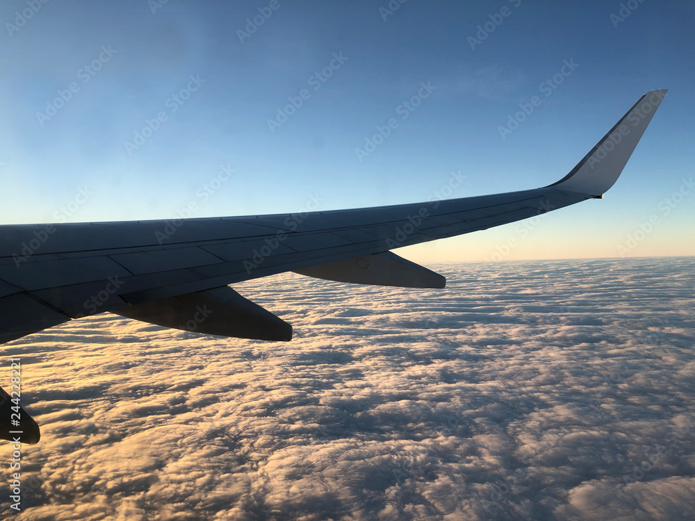 Aeroplane wing taken looking outside and Aeroplane window showing ...