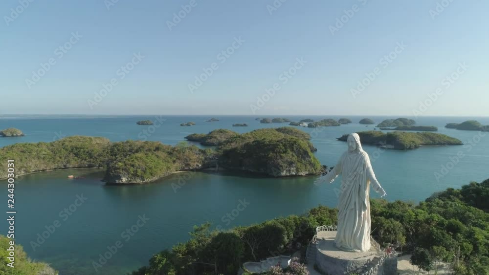 Statue of Jesus Christ on Pilgrimage island in Hundred Islands National ...
