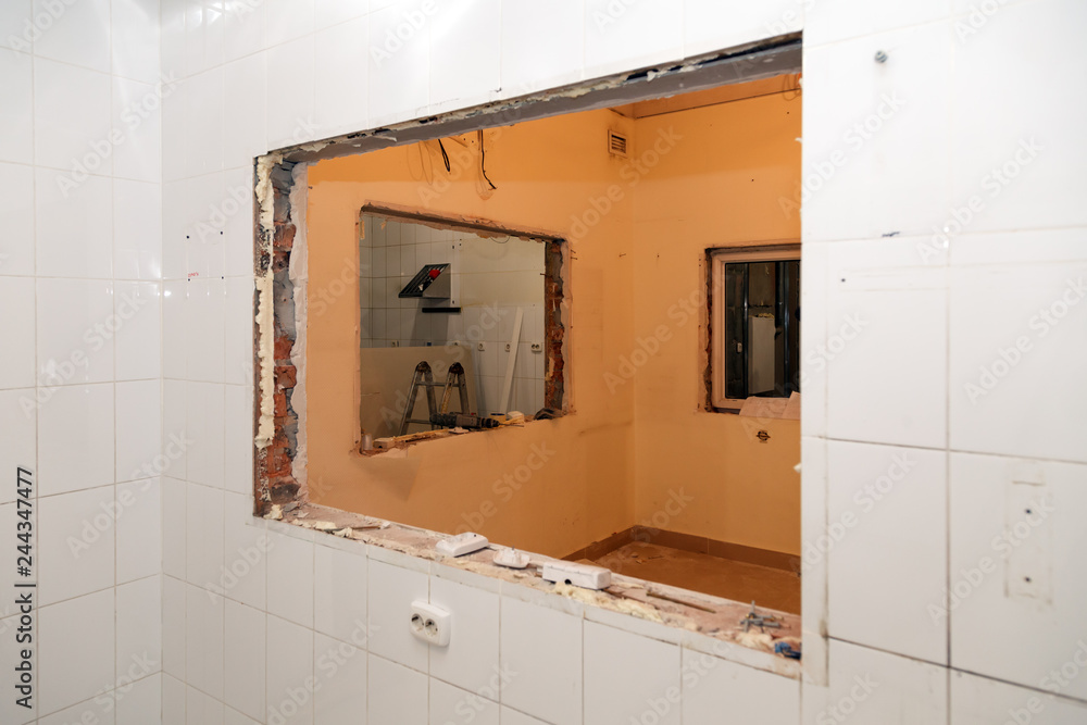 Repair and replacement windows in office building, destroyed window ...