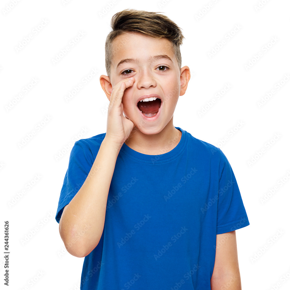 Cute boy in blue T-shirt shouting. Speech therapy concept over white ...