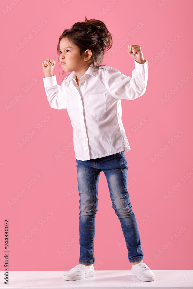 angry little child girl in white shirt with hairstyle Stock Photo ...