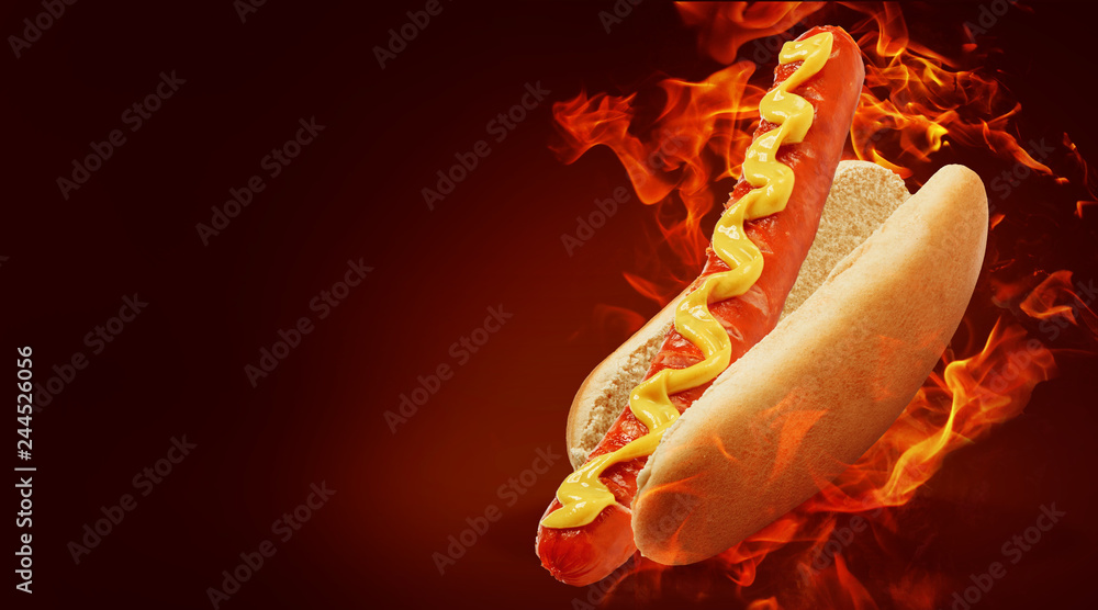 hot dog with big sausage and mustard on fire background Stock Photo ...