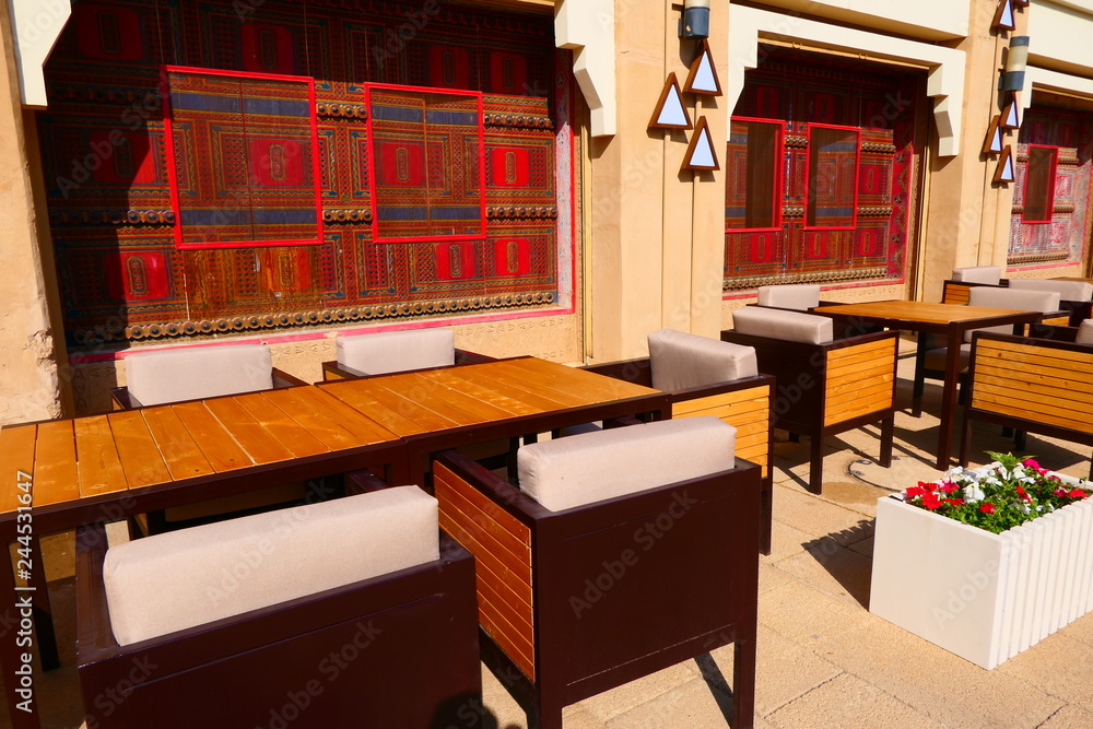 Some coffee chairs and tables in the historic part of Diriyah in Saudi ...