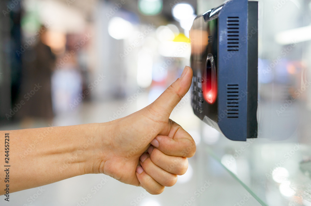Track Employee Hours Using Biometric Fingerprint Scanner. Stock Photo ...