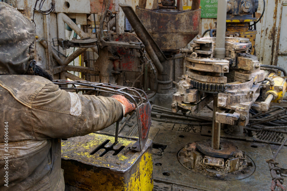 Offshore oil rig worker prepare tool and equipment for perforation oil ...