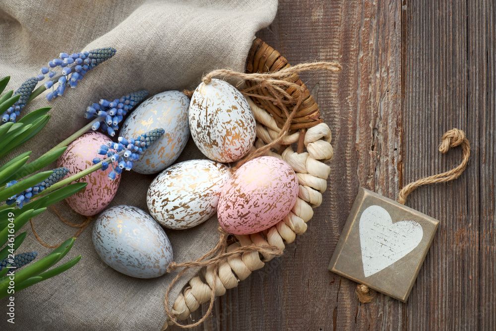 Rustic Easter background with eggs, blue hyacinth flowers and wooden ...