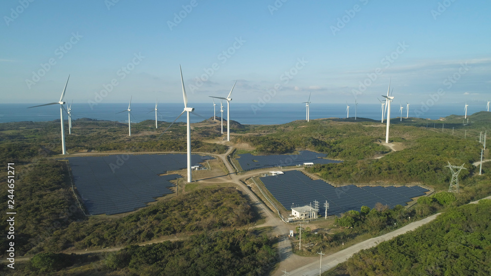 Aerial view of Windmills for electric power production on the seashore ...