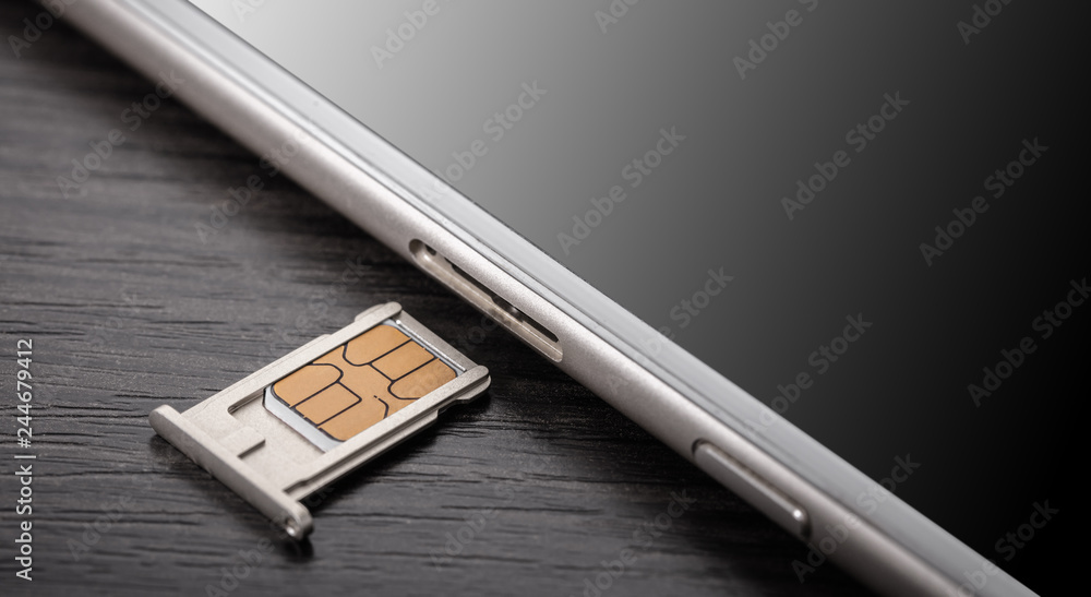 mobile phone and sim card Stock Photo | Adobe Stock