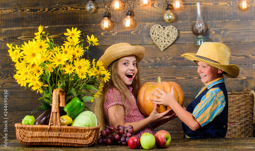 Siblings having fun. Family farm. Farm market. Children presenting farm ...