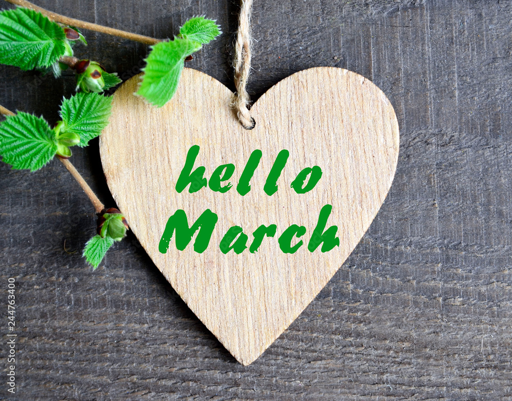 Hello March greeting card with decorative heart and green spring tree ...