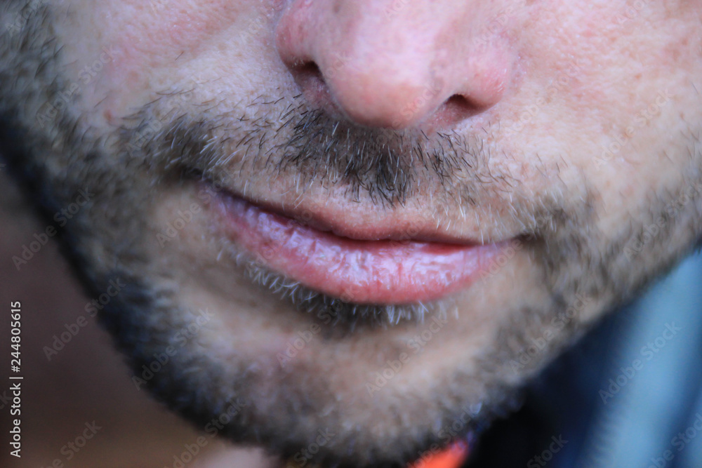 Beautiful thin men's lips and light unshaven face close up Stock Photo ...