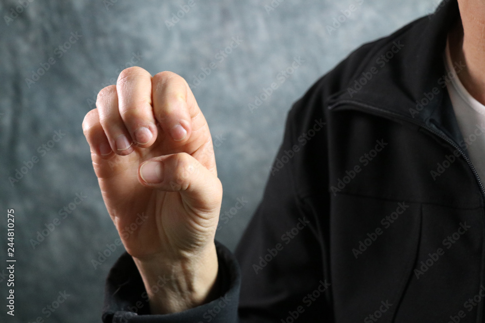 American Sign Language (ASL) letter E held in correct position next to ...