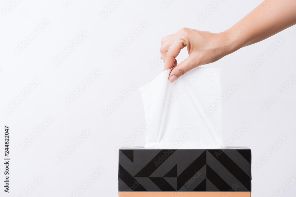 Healthcare concept. Woman hand picking white tissue paper from tissue ...