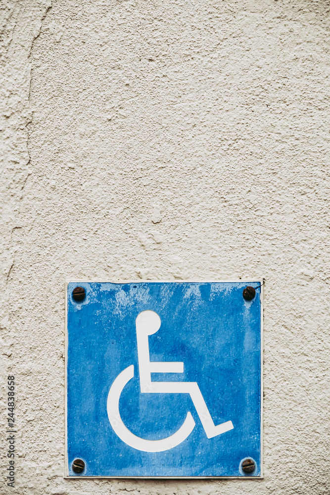 Symbole de handicap, pictogramme bleu et blanc Stock Photo | Adobe Stock