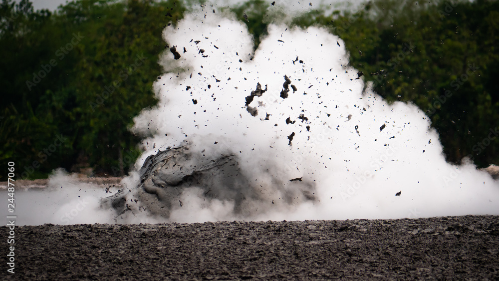 mud volcano with bursting bubble bledug kuwu. volcanic plateau with ...
