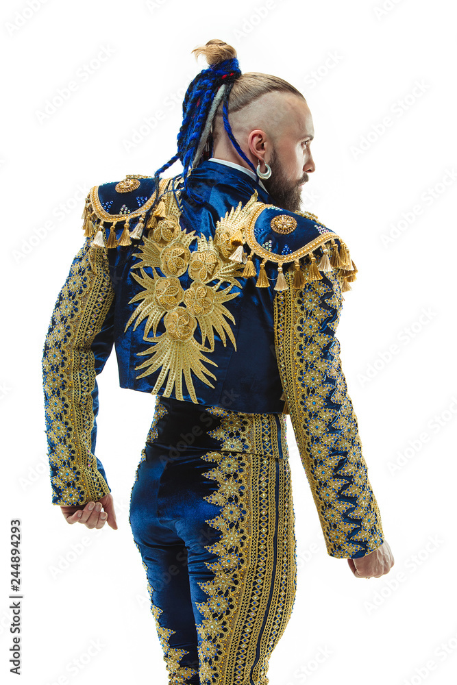 Torero in blue and gold suit or typical spanish bullfighter isolated ...