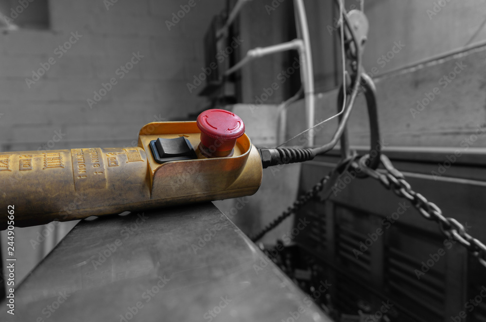 Control for an indoor crane hoist in a factory workshop with selective ...