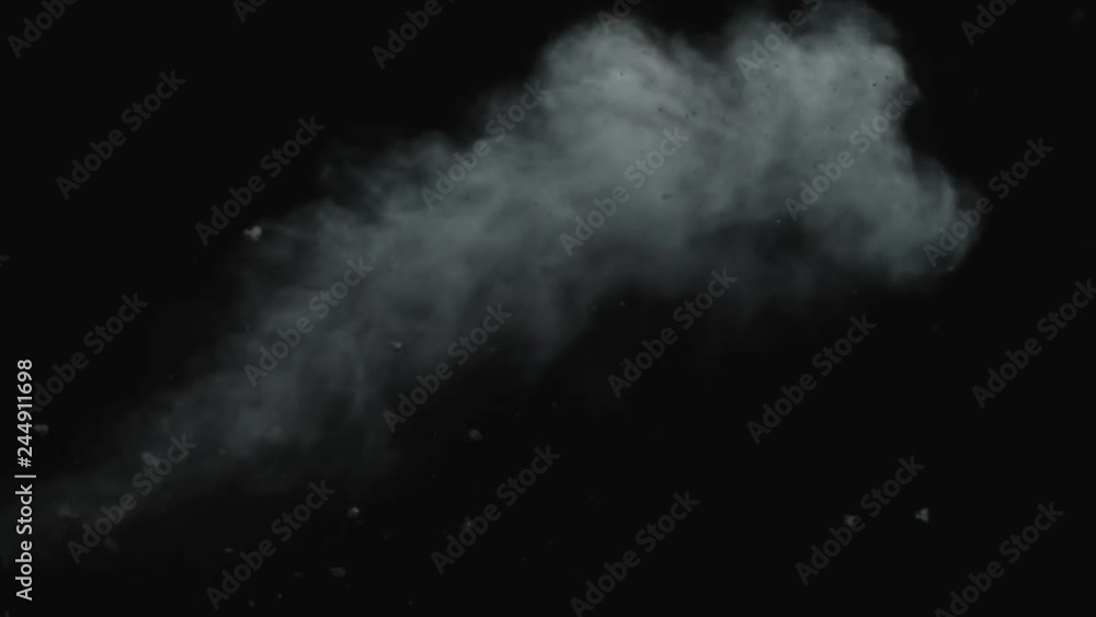 Dusty bullet hit on a wall with chunks of debris flying out. White ...