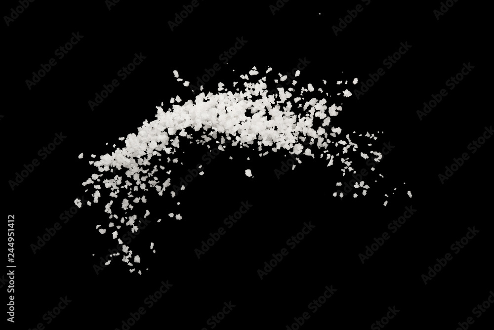Salt splash explosion isolated on black background , freeze stop motion ...