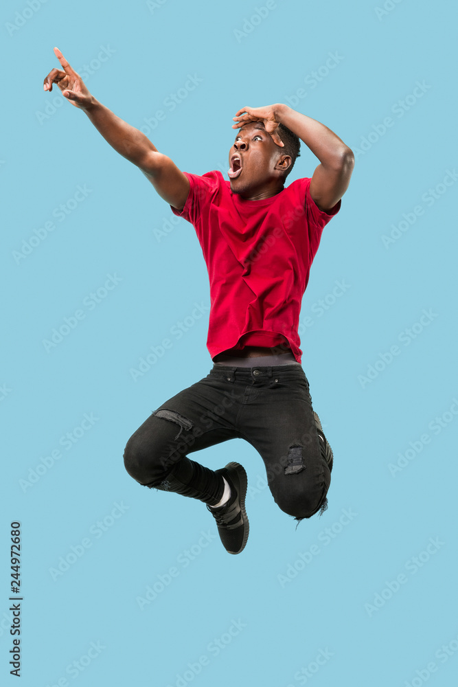 Freedom in moving and forward motion. The happy surprised young african ...