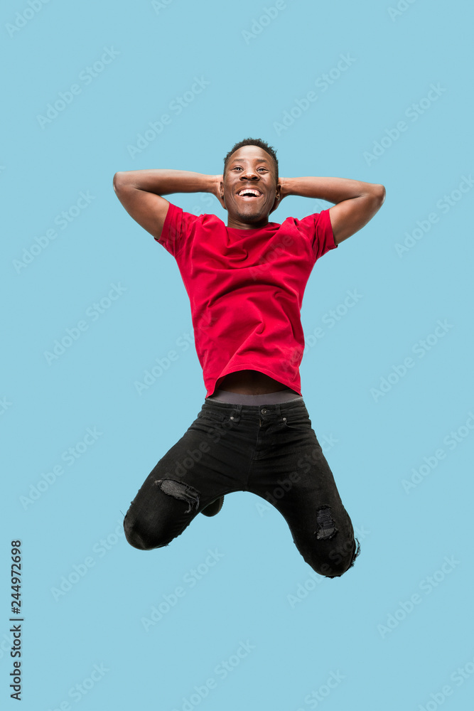 Freedom in moving and forward motion. The happy surprised young african ...