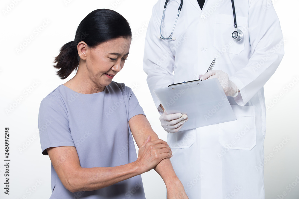 Asian Middle 60s age Woman Patient check up health with Doctor. Aging ...