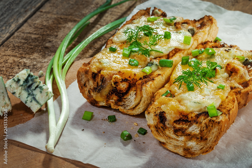Open face cheese sandwich toated in an oven. Delicious homemade cheese ...
