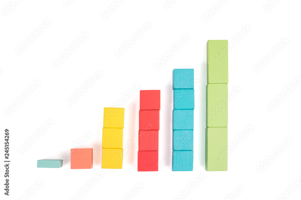 Toy wooden blocks as financial graph. Graph with four 4 steps. Growing ...