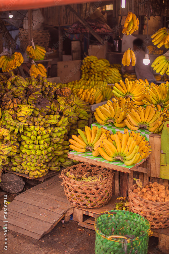yellow and green Bananas in a Philippine local banana store hanging and ...