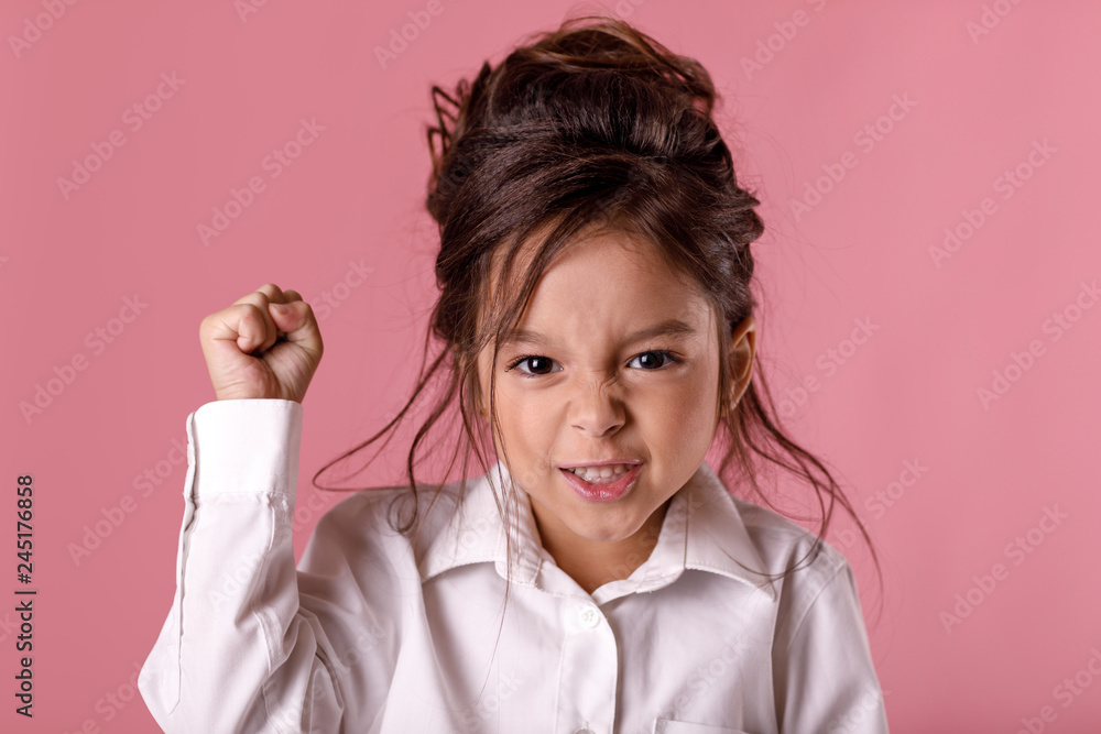 angry little child girl in white shirt with hairstyle Stock Photo ...