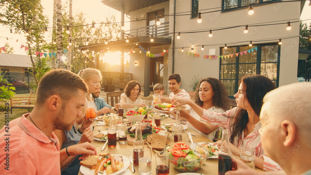 Big Family Garden Party Celebration, Gathered Together at the Table ...