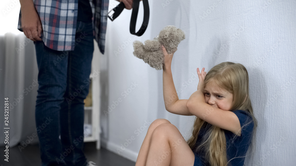 Violence in family, crazy father threatening frightened little girl ...