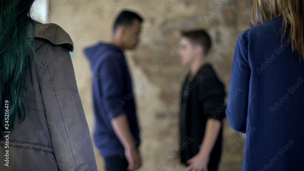 Teenage conflict, two boys fighting for girl, street violence, self ...