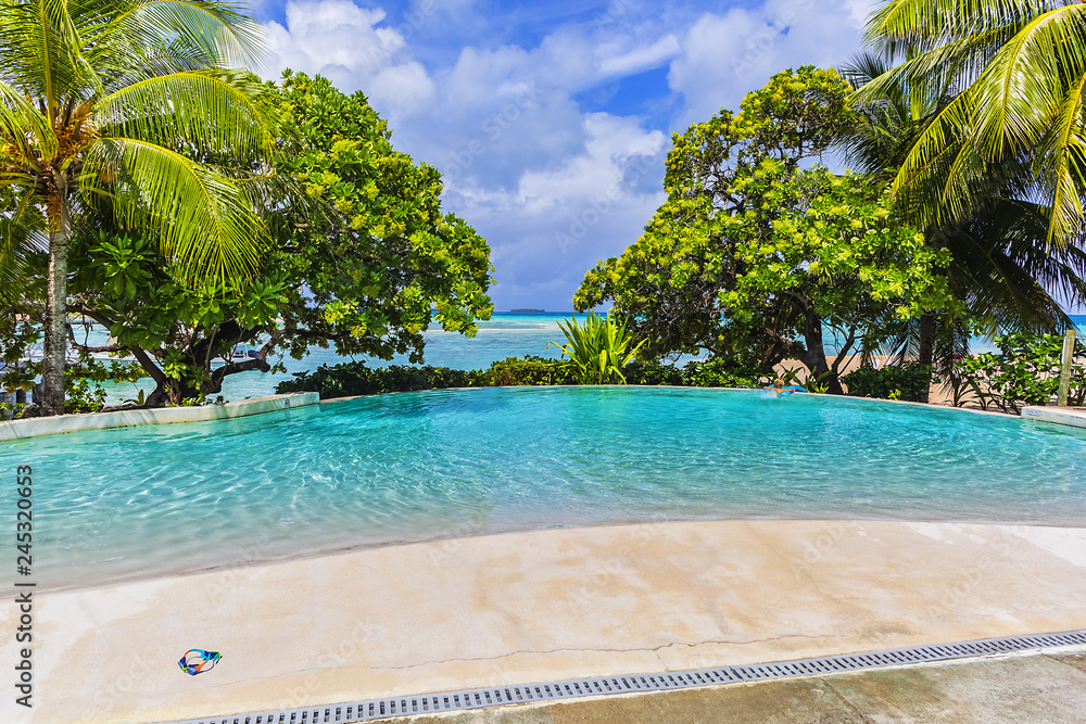 Coastline with a tropical beach and the turquoise water of the inner ...