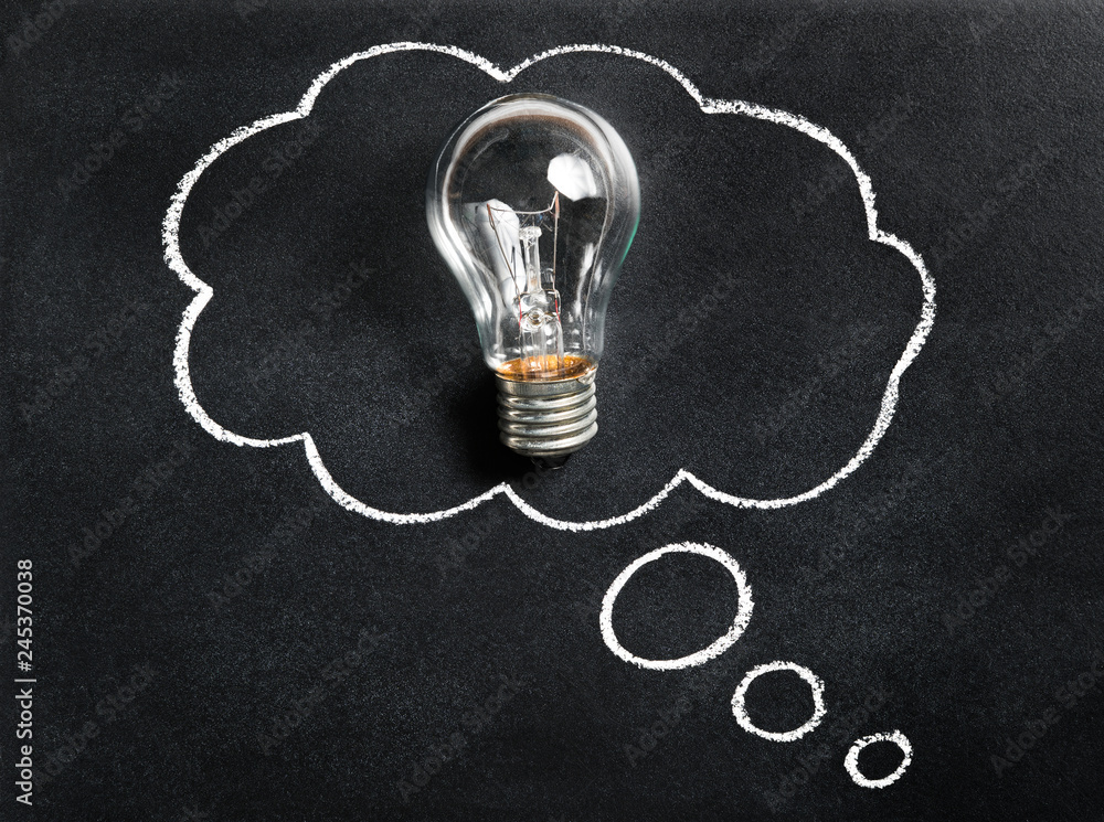 Light bulb on chalkboard. Thinking of new great idea. Brainstorming and creating. Creativity ...