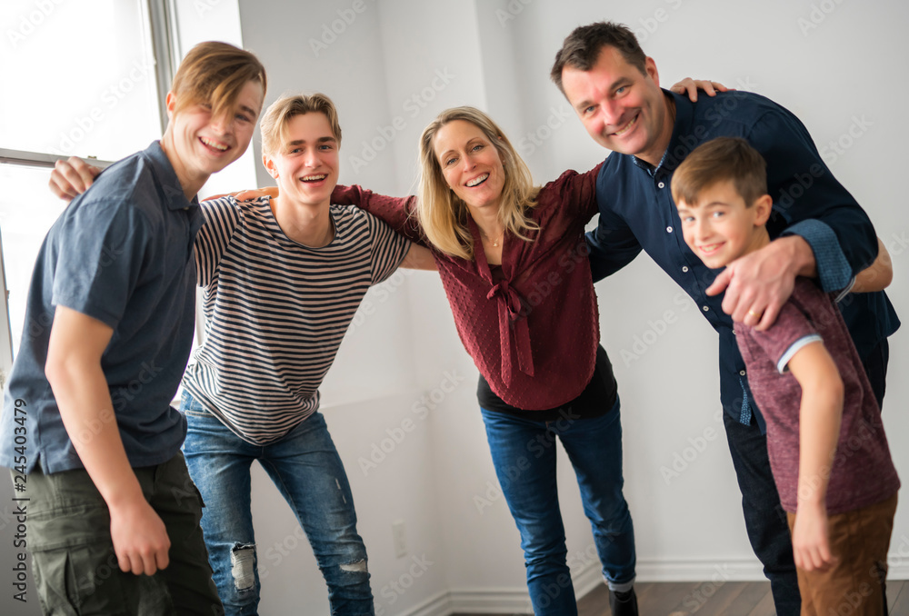 A portrait of a big Family at home having fun together Stock Photo ...