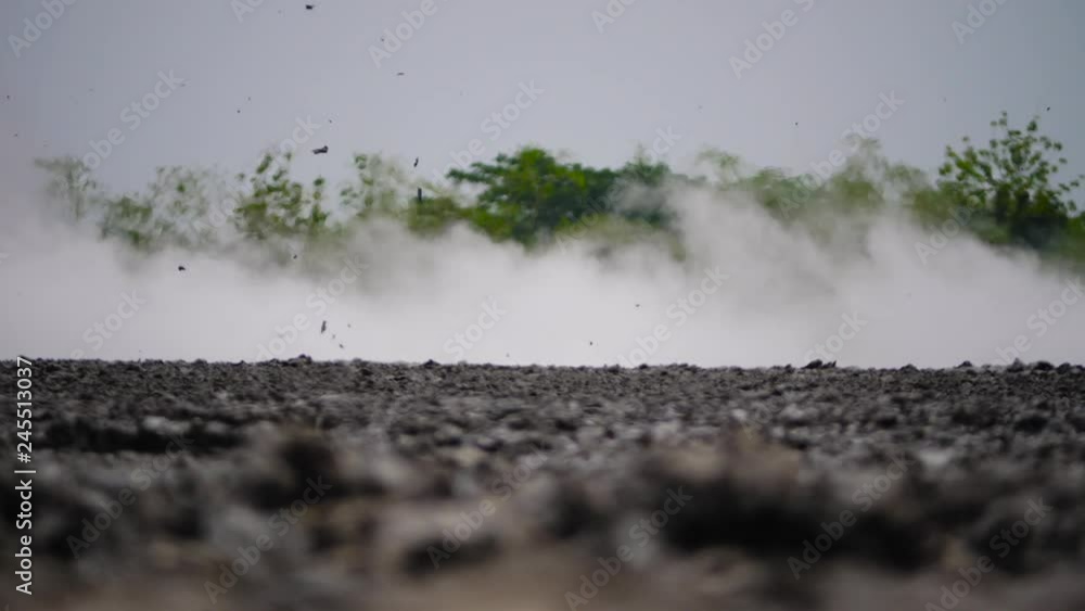 mud volcano with bursting bubble bledug kuwu. volcanic plateau with ...