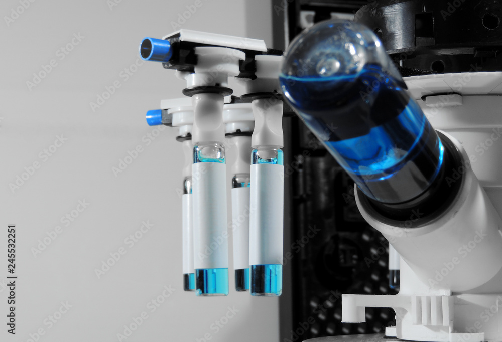 Laboratory device with spinning part testing chemical solvent in ...