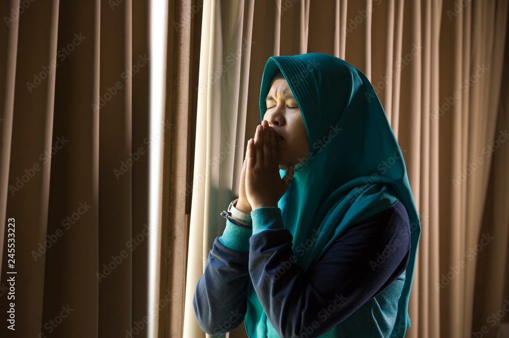 young sad and depressed Muslim woman in Islam traditional Hijab head ...
