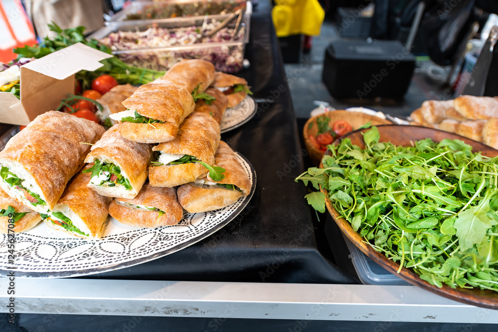 Fresh display of pile of panini bread mozzarella melted cheese ...