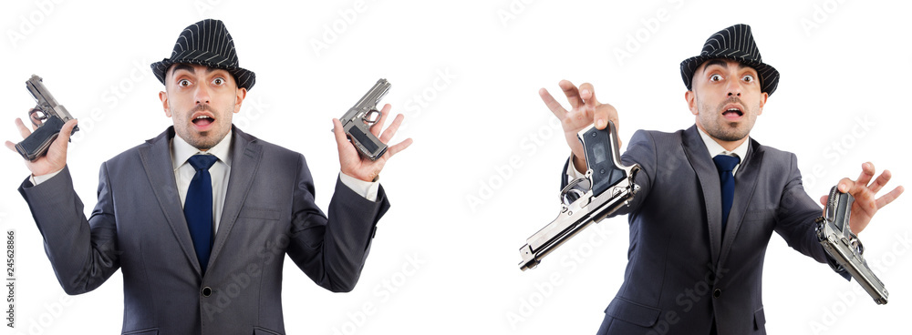 Young gangster in suit with handguns Stock Photo | Adobe Stock