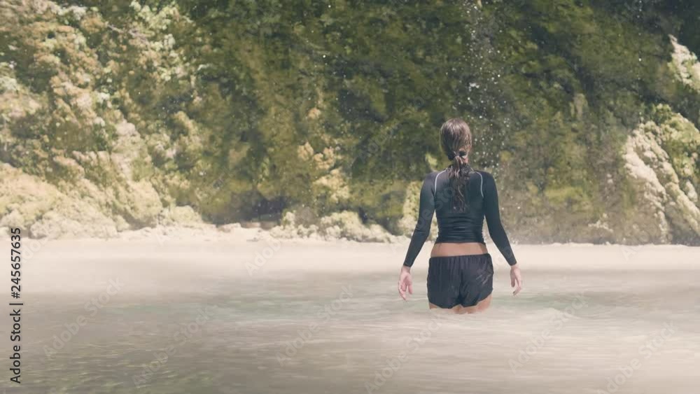 Vidéo Stock Traveling woman in mountain lake and water stream flowing ...