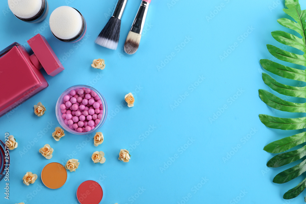 Beauty background with facial cosmetic products, leaves and cherry ...
