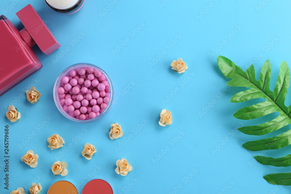 Beauty background with facial cosmetic products, leaves and cherry ...