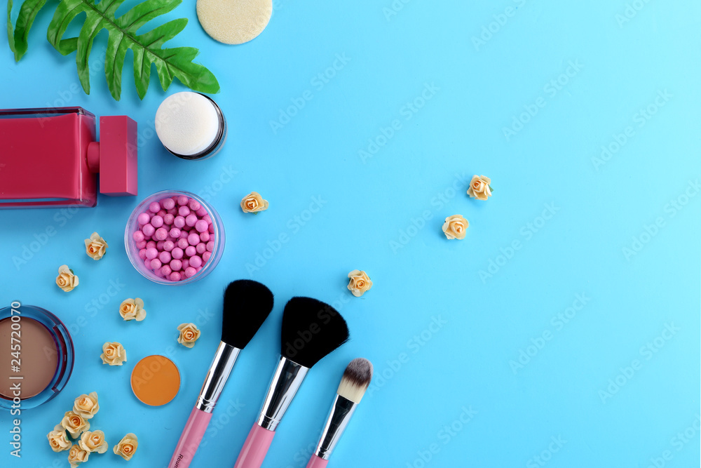 Beauty background with facial cosmetic products, leaves and cherry ...